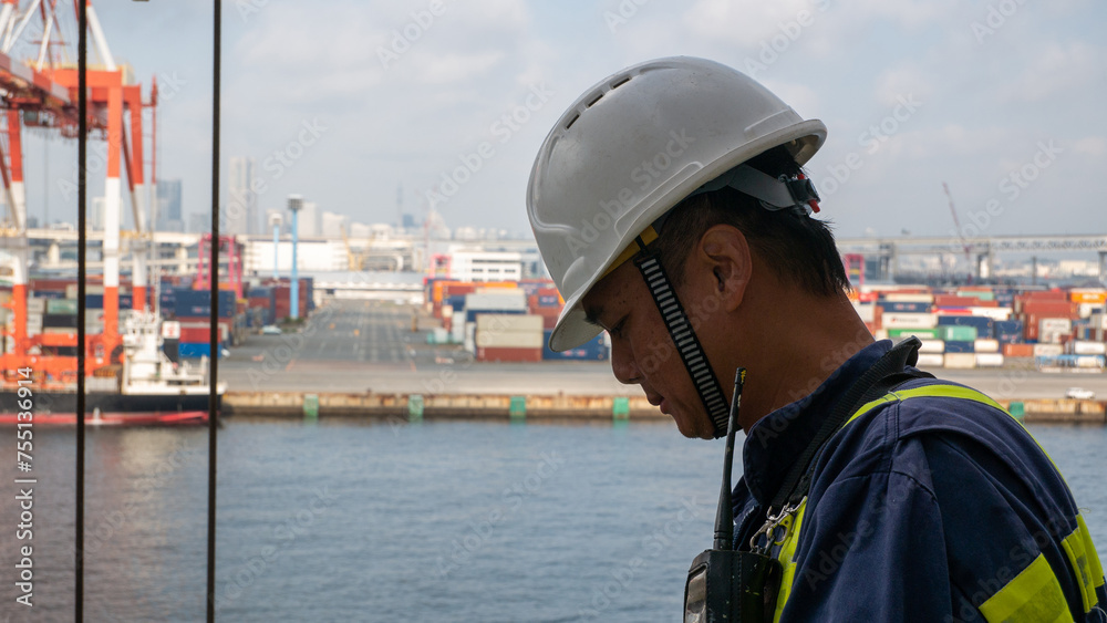 Seaman crew member of cargo vessel equipped with personal protective ...