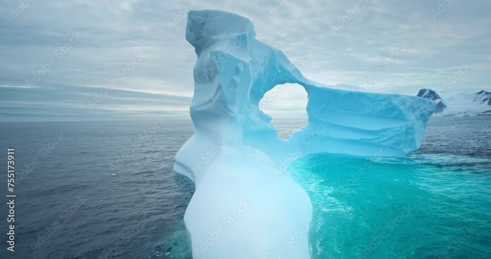 Stockvideon Large iceberg with melted hole floating arctic ocean. Big ...