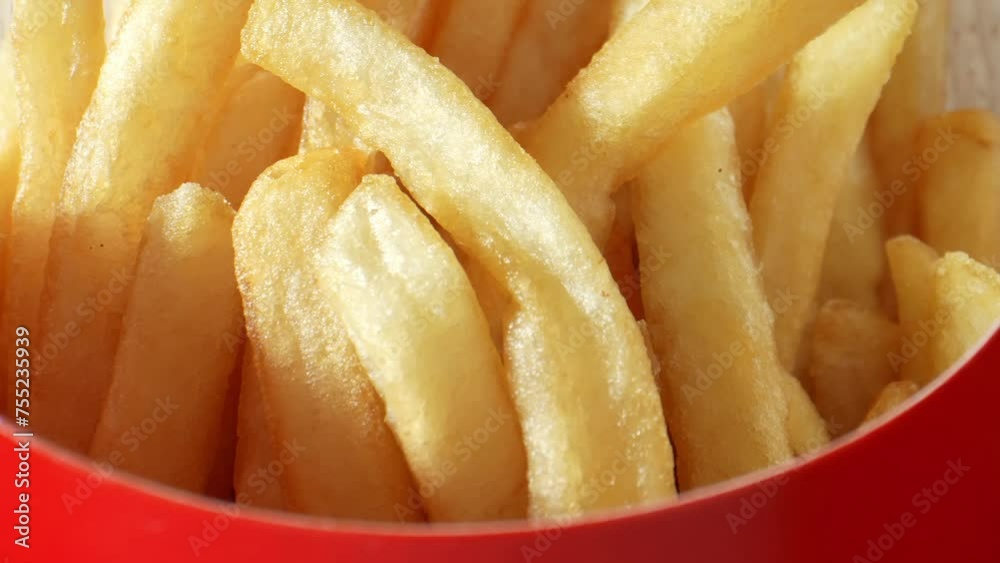 Crispy golden French fries, a beloved side dish made from deep-fried ...
