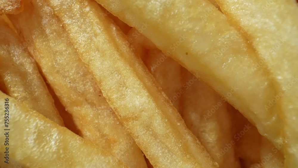 Golden strips of potatoes, fried to crispy perfection, French fries ...