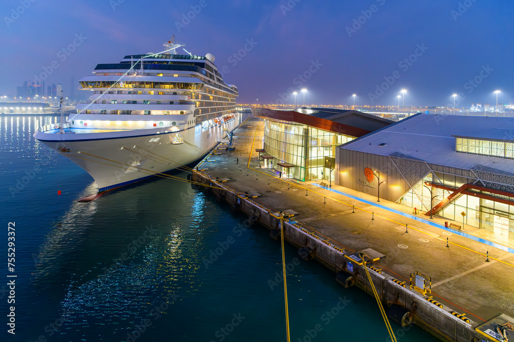 Evening view of the MS Riviera luxury cruise ship operated by Oceania Cruises docks at the ...