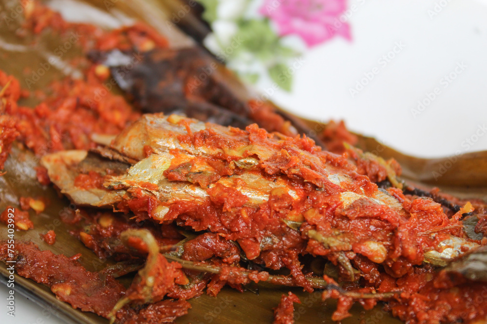 Pepes ikan pedas, or grilled fish with red chili and herbs, wrapped in ...