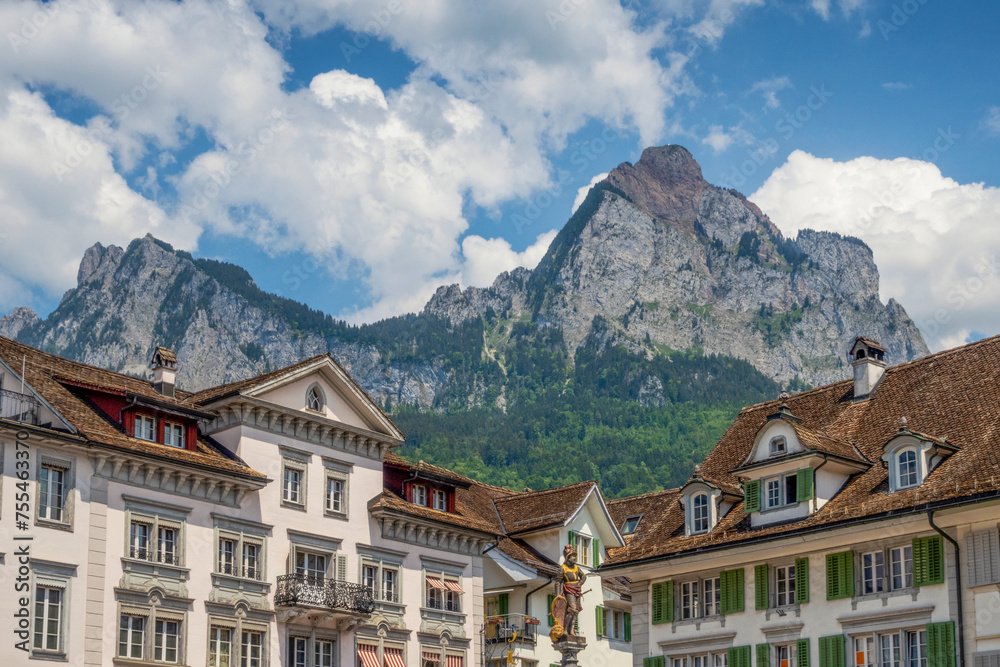 Main Square with summit of Grosser Mythen mountain in background ...