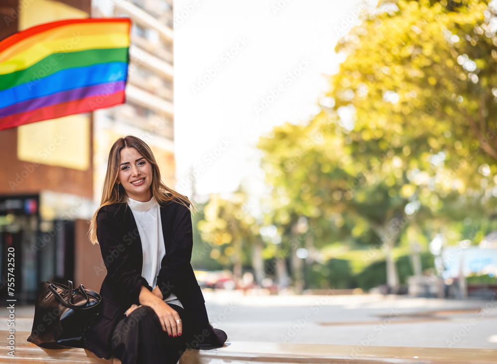 Inclusive urban backdrop: Confident latina businesswoman smiles seated ...