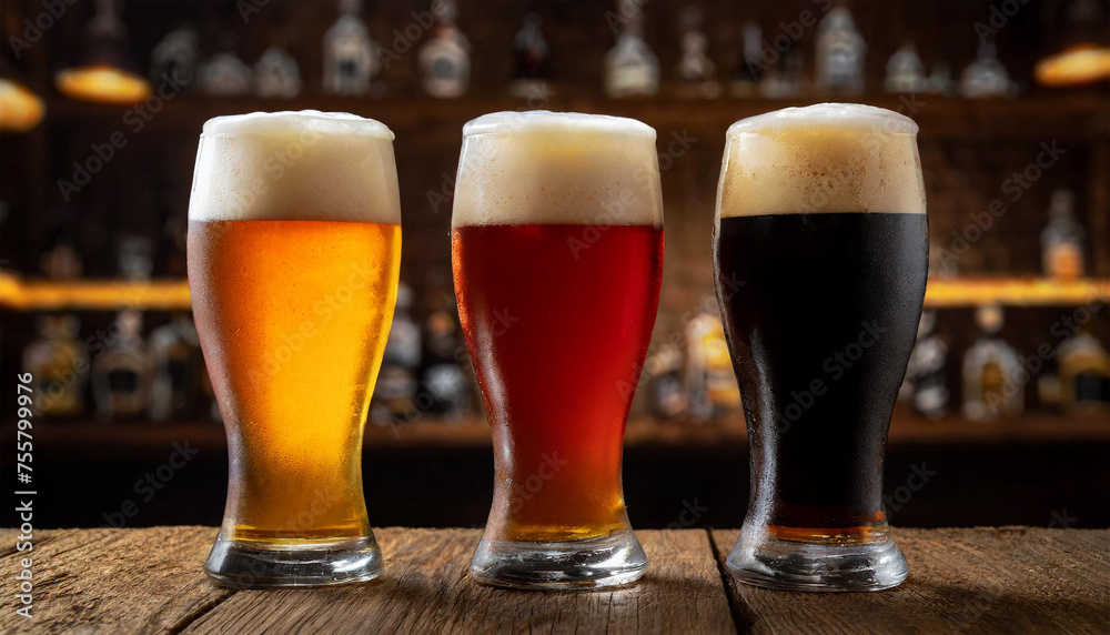 Three glasses of fresh beer, different types, blonde beer (lager beer ...