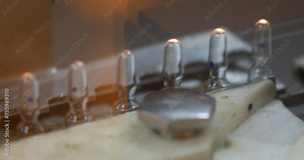 ampoules. vaccine pharma production machine manufacturing a lot of ...