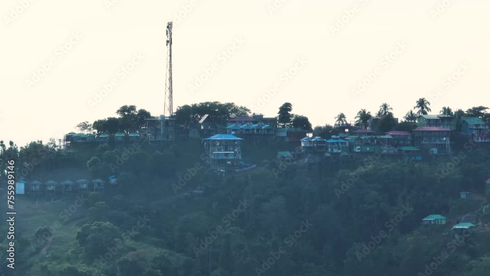 Beautiful mountain top cottages. Lush green forest. Clouds drifting ...