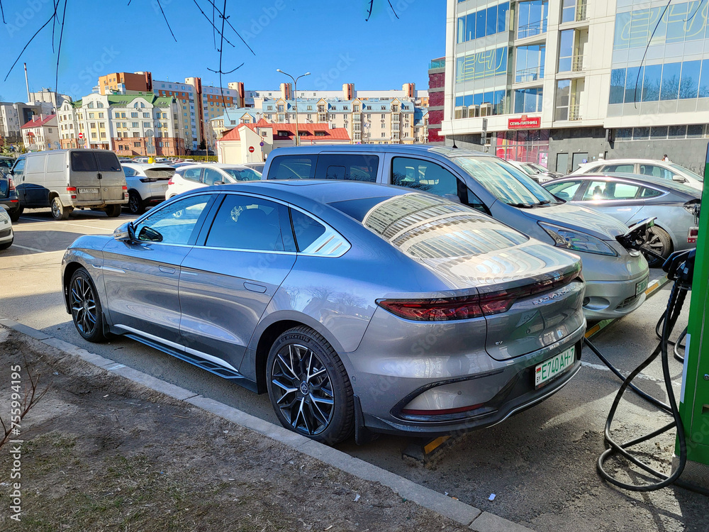 Minsk, Belarus. Mar 10.2024. BYD Han EV 3.95 charge battery at power ...