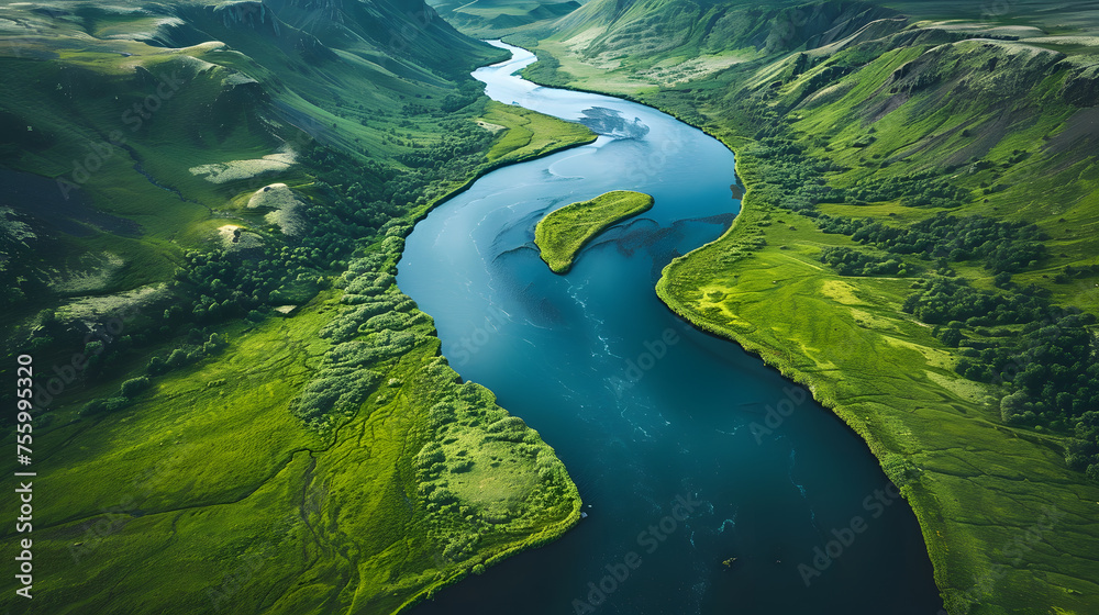 An aerial perspective showcases a river meandering through a valley ...