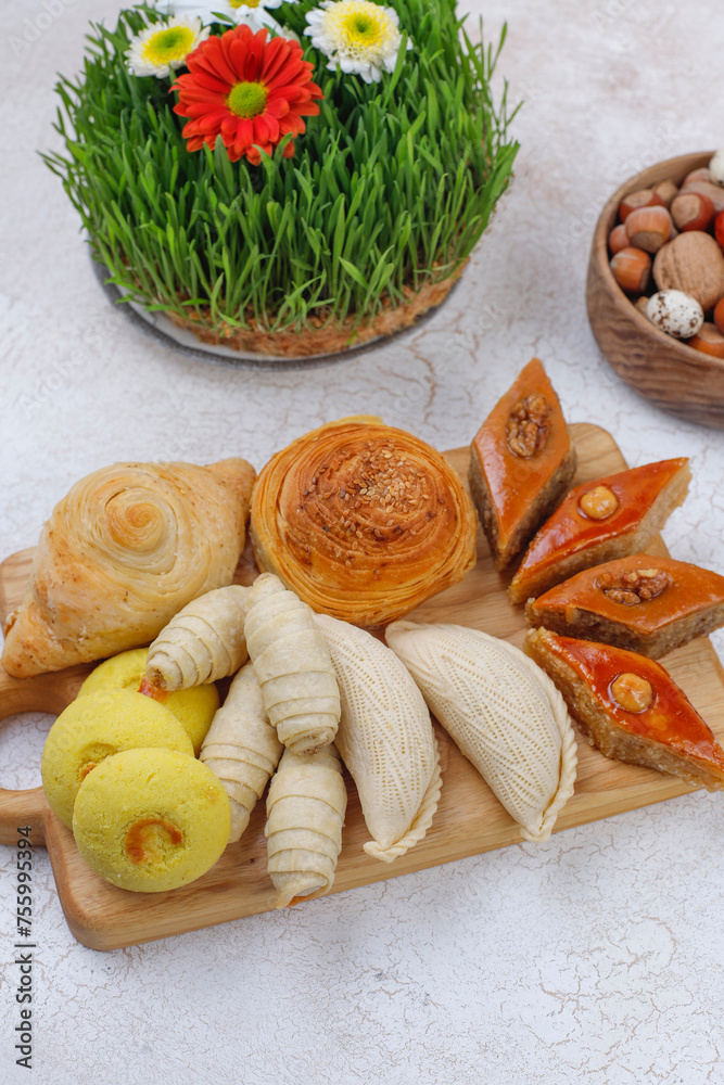Traditional Azerbaijan holiday Novruz background with green semeni ...