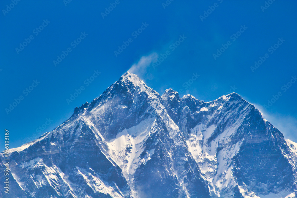 Jet streams fly off the summit of Mount Lhose, the 4th highest mountain ...