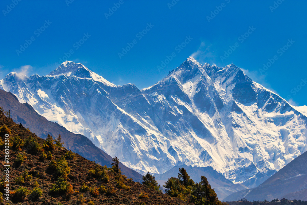 Mount Everest, Nuptse jagged ridge and Lhotse summit towers over the ...