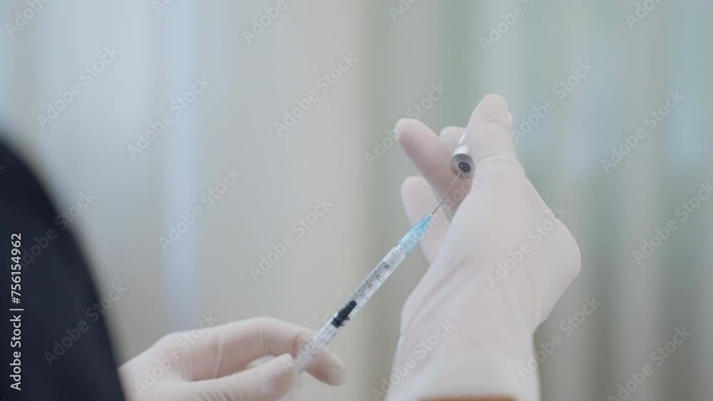 syringe prepare for a Botox injection in cosmetology clinic. Hyaluronic ...