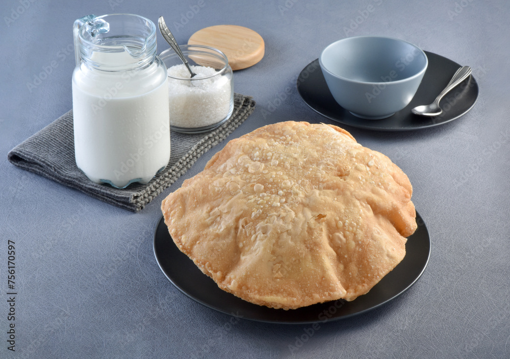 Khajla is a flaky cereal food made with wheat flour and lot of ghee ...