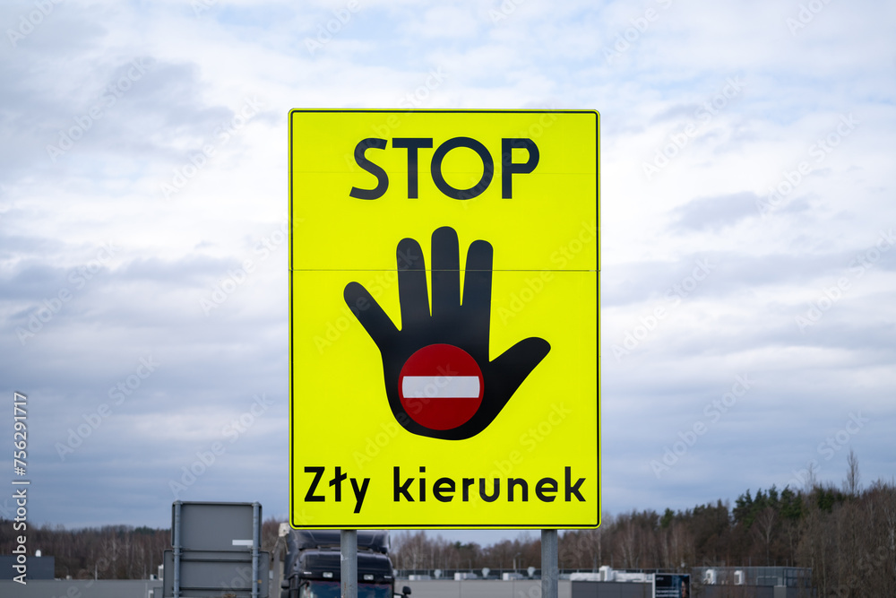 Stop - zły kierunek, means wrong direction. Information board with a ...