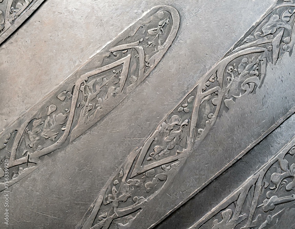An image of titanium metal with intricate etched designs, highlighting ...