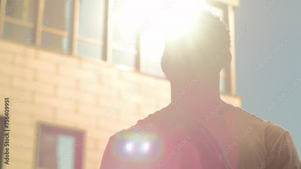 African American man begging wishing male silhouette in sunshine in ...