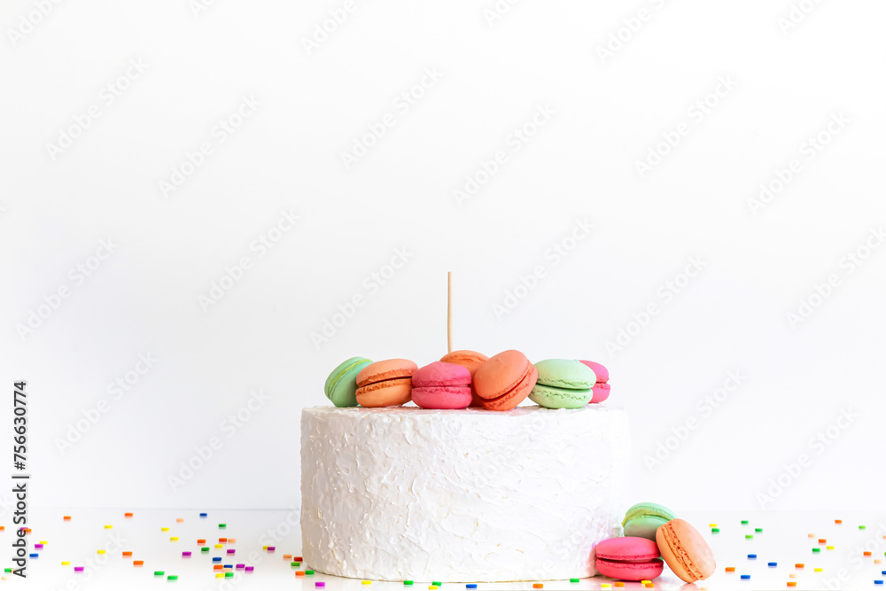 Cake topper mock up . Styled with colorful macaroon against a white ...