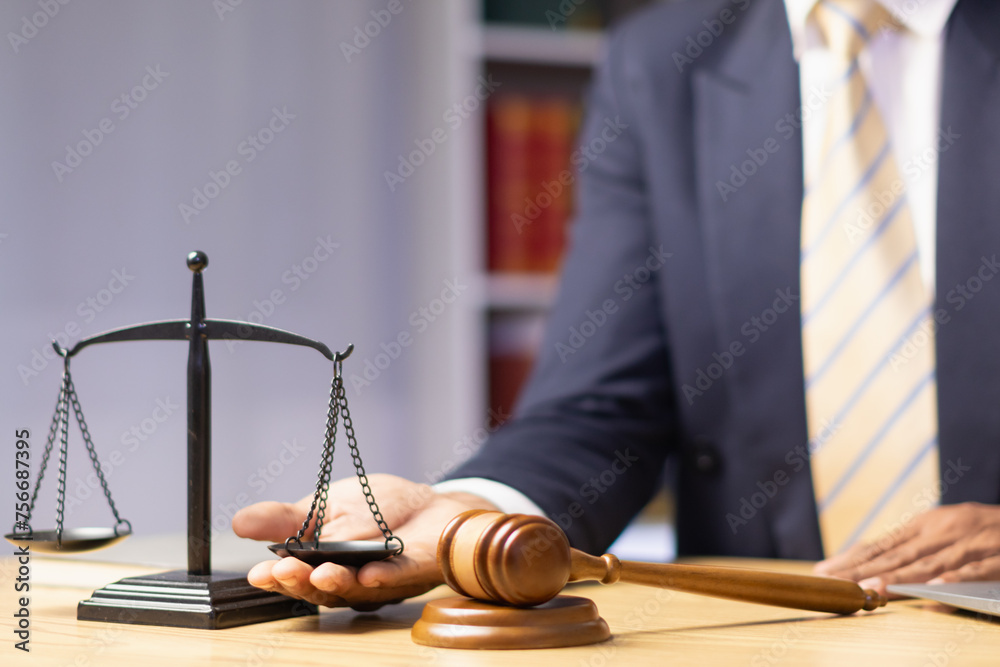 Brass scales are placed on lawyers desks in legal advice offices as a ...