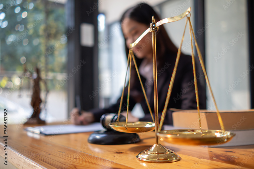 Brass scales are placed on lawyers desks in legal advice offices as a ...