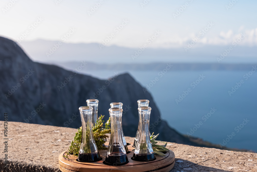 Wooden plate with strong sweet Croatian aperitif fruity drinks like ...