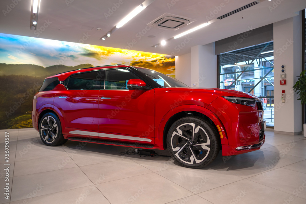new red Vinfast vf 9 electric SUV in Studio, advanced technologies in ...