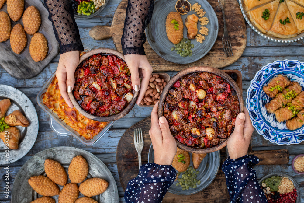 Casserole kebab named belen tava or sac saç kebabı . Roasted meat with ...
