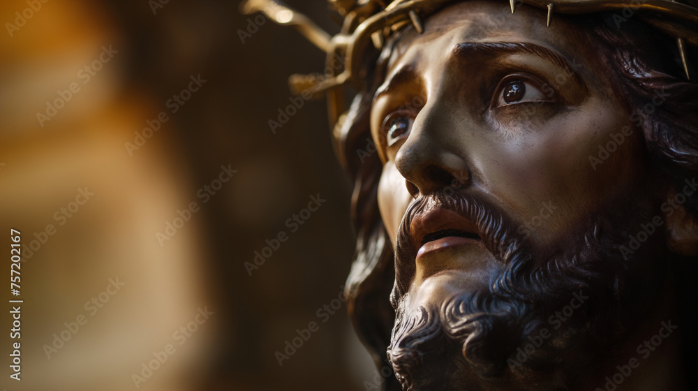A close-up on the face of the resurrected Jesus, half in shadow and ...