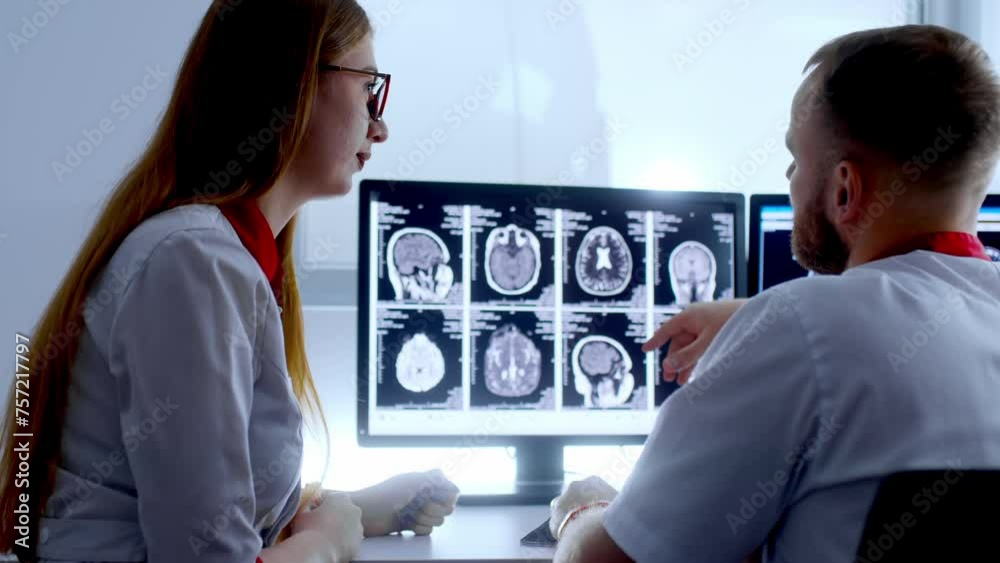 In Control Room Doctor and Radiologist Discuss Diagnosis while Watching ...