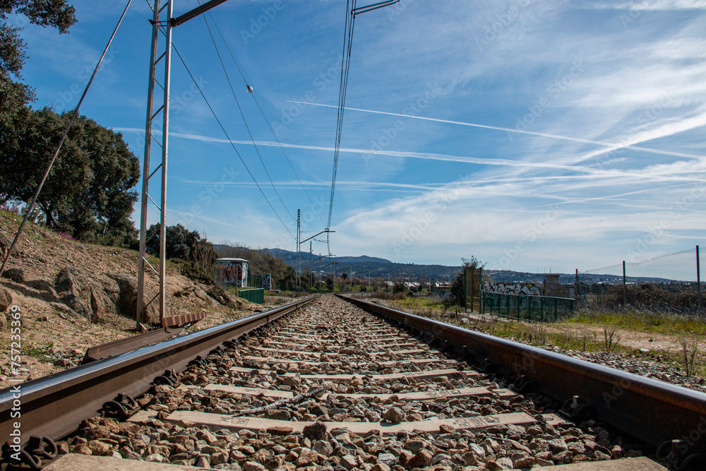 Train tracks where you can see all the details of the railway, cables ...