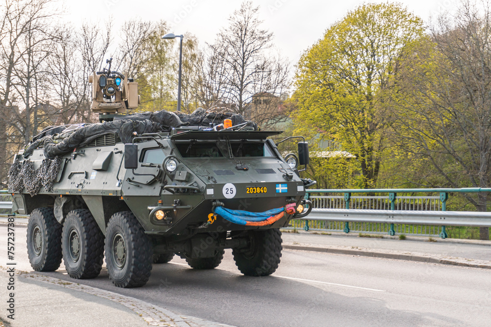 Fully equipped military armored vehicles on the road, defense ...