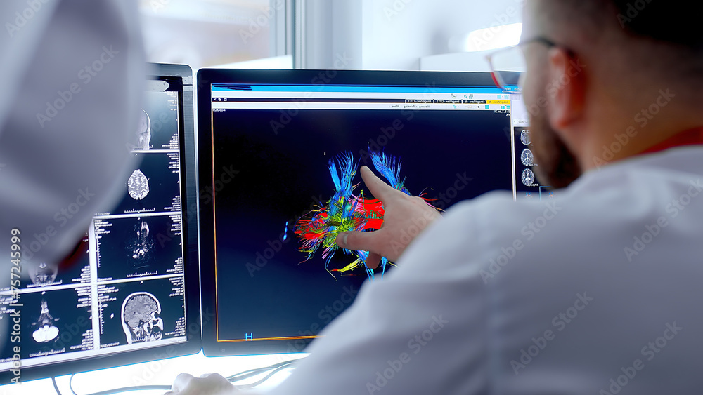Diagnosis while Watching Procedure and Monitors Showing Brain Scans ...