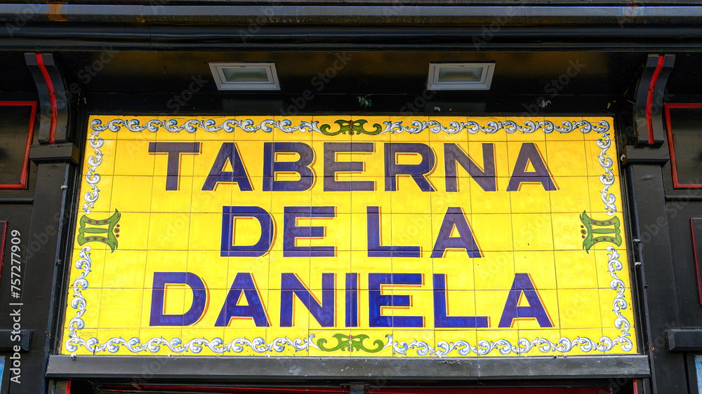 Tile business sign. Restaurant named Taberna de la Daniela, Madrid ...