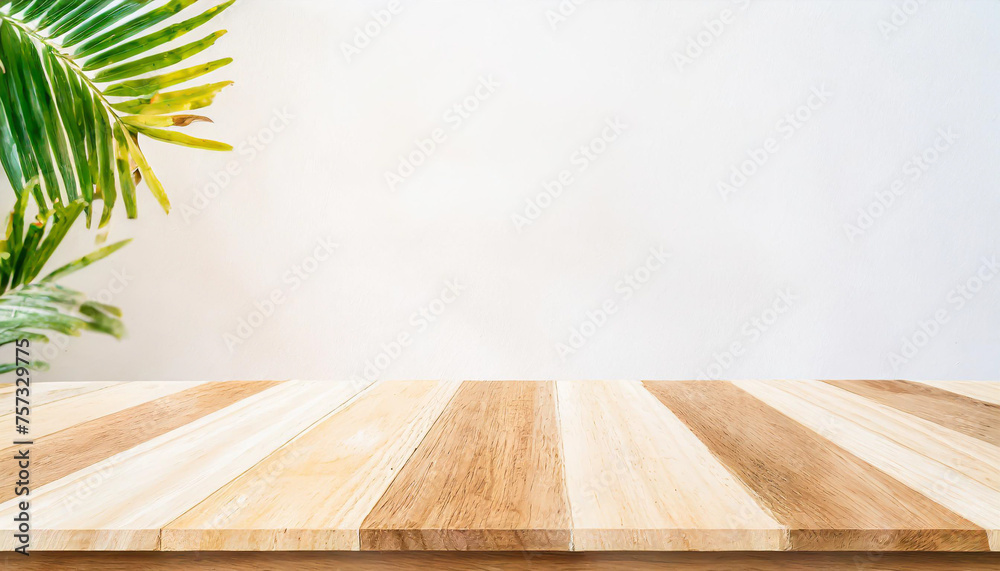 Real wood table top texture on white wall room background.For create ...