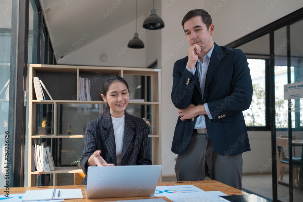 Mature executive helping new employee, Mentor, manager and teamwork ...