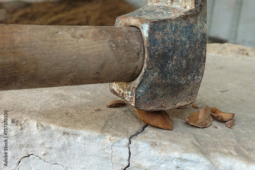 A crack in the concrete wall that appeared when trying to crack the nut ...