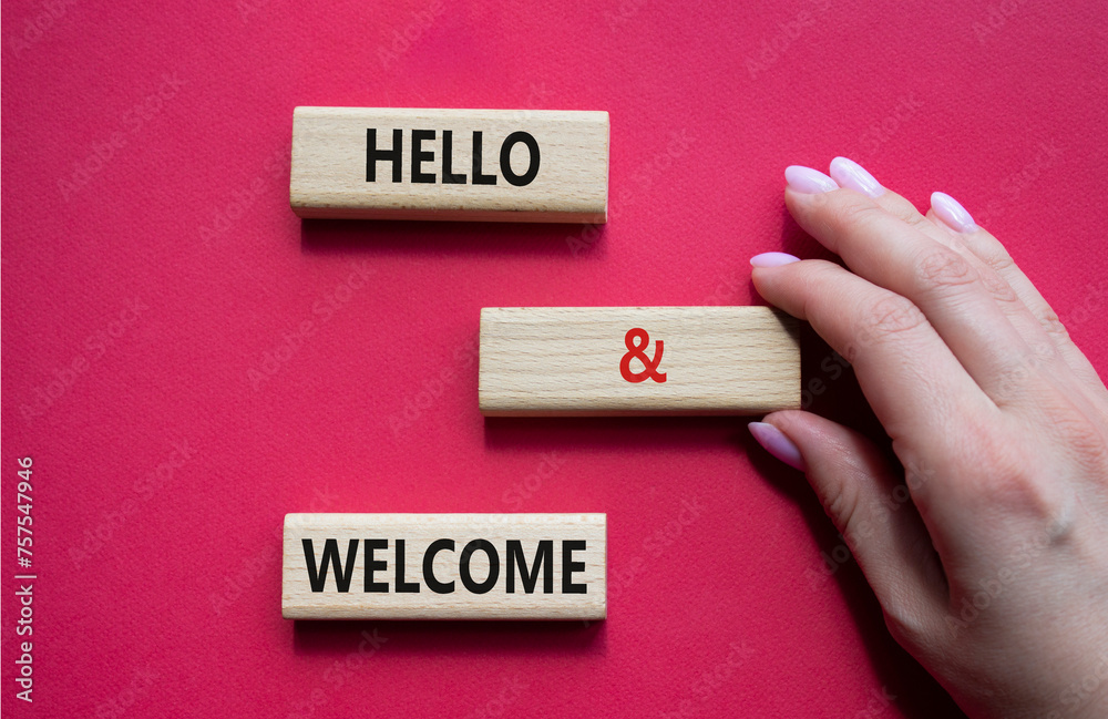 Hello and Welcome symbol. Concept words Hello and Welcome on wooden ...