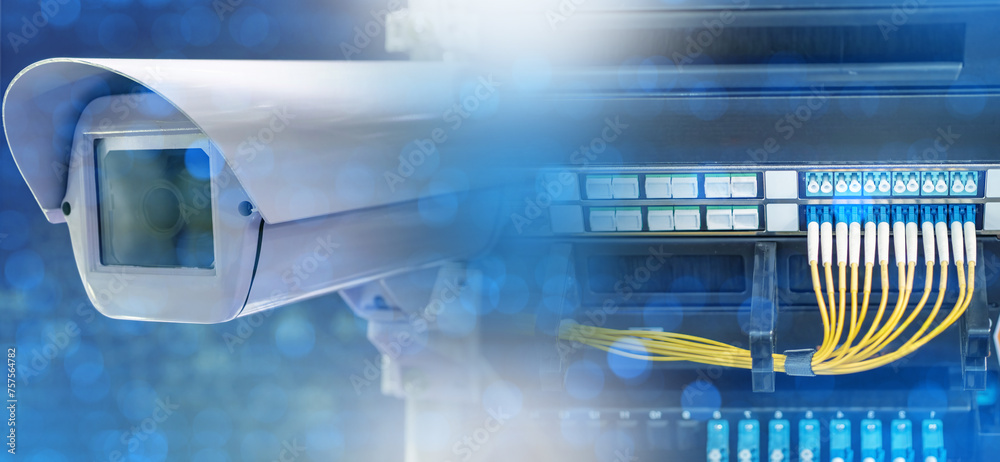Surveillance camera is connected to network. Server equipment near CCTV ...