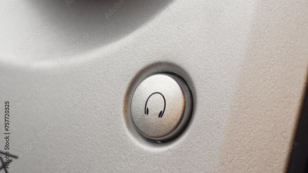 Finger press turn on headphone symbol button key home theater system ...