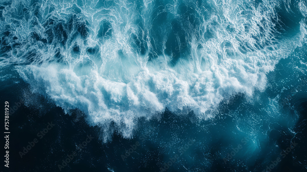 Spectacular aerial view of frothy ocean waves creating artistic ...