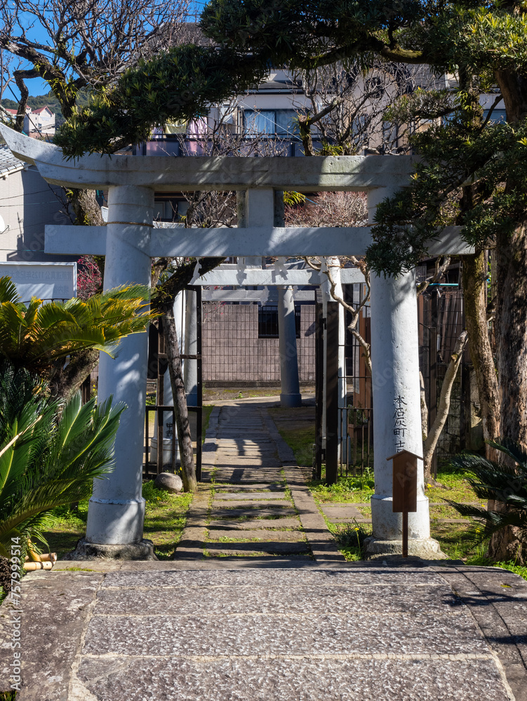 Nagasaki, Japan - February 17, 2024: Stone torii gates on the grounds ...