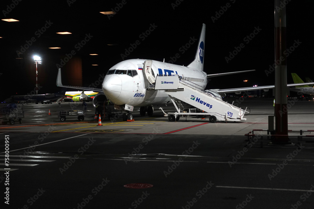 Passenger supersonic plane Boeing 737-500 UTair Airlines after landing ...