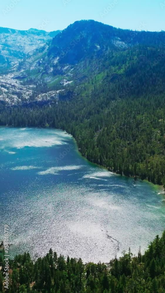 Beautiful Lake Tahoe in the foot of majestic mountains. Stunning view ...