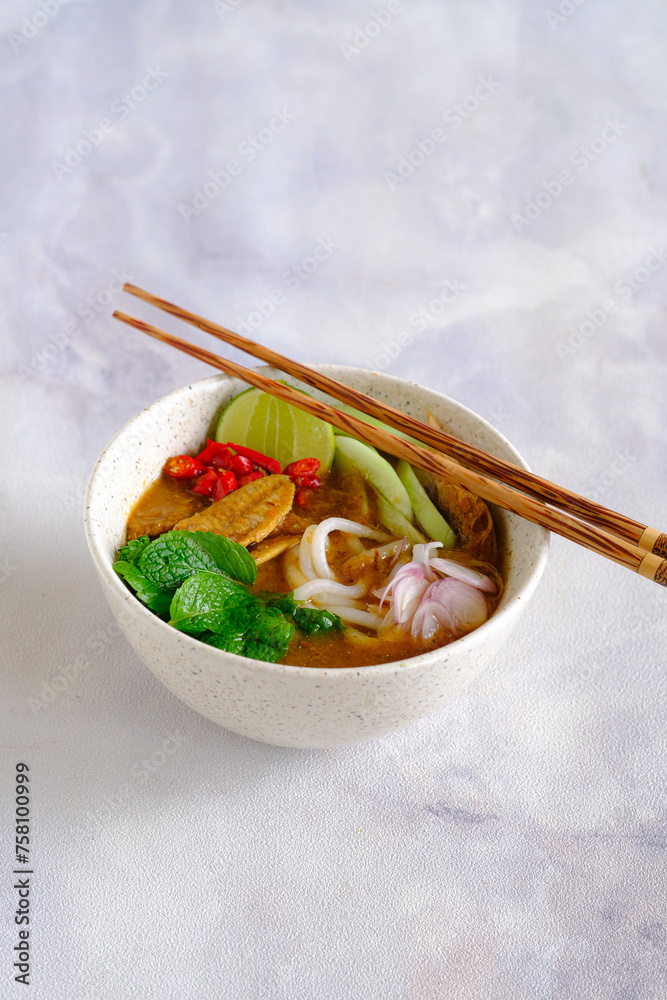 laksa ikan, asam laksa, rice noodle,vegetables, filet fish with sour ...