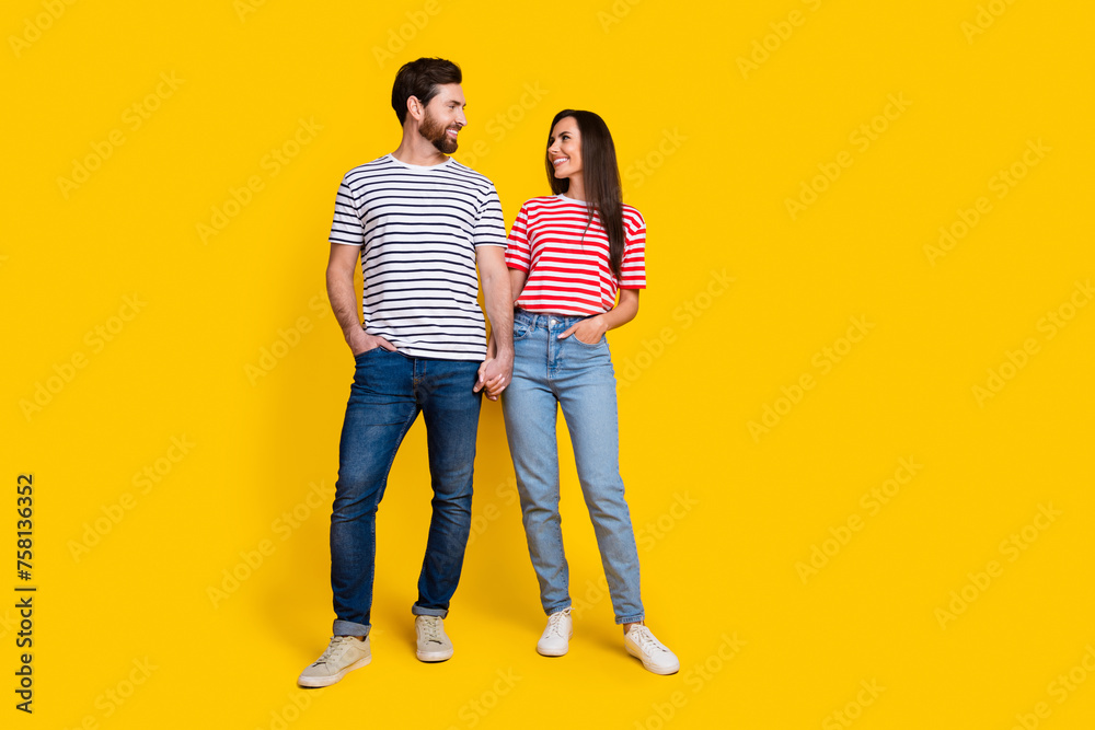 Full length photo of boyfriend girlfriend wear striped t-shirt hold ...
