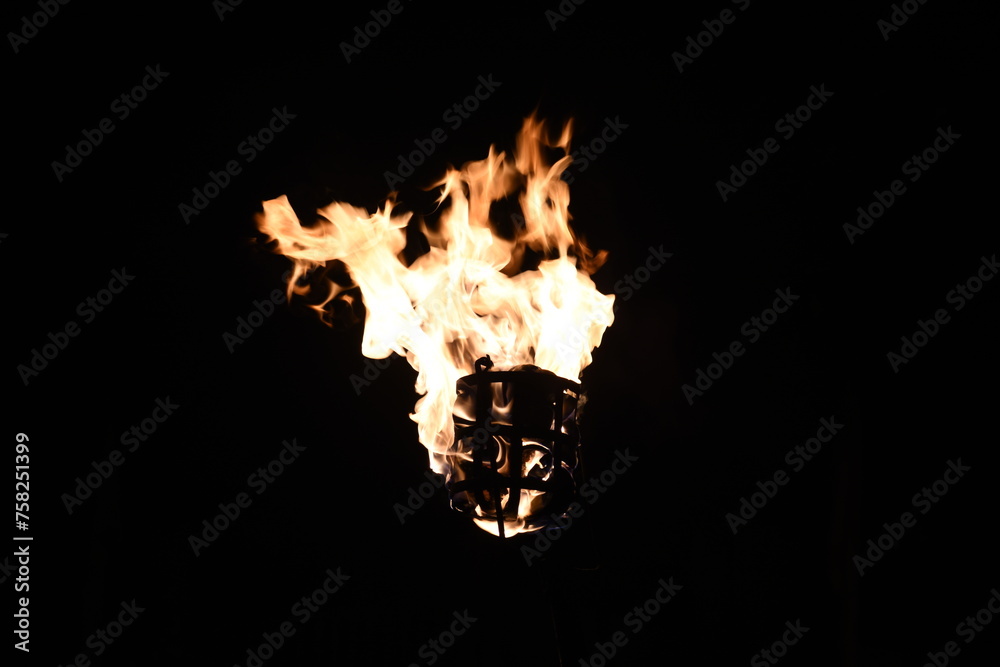 Flames of a coppara torch that lighting in Kandy Esala Perahera at ...