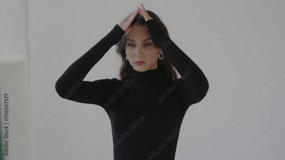 Beautiful woman model posing for camera fashion industry behind scenes ...