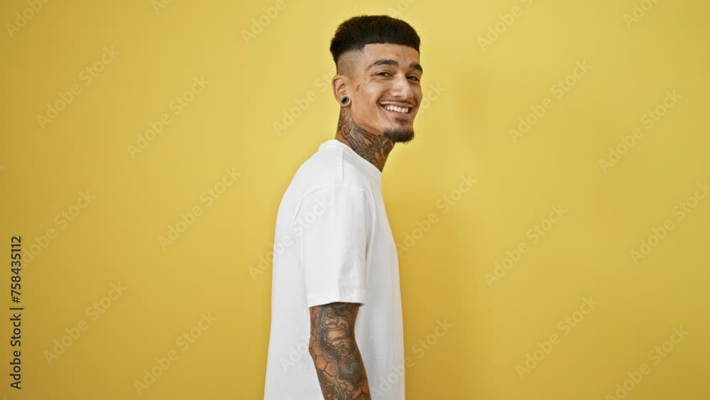 Confident young latin man, with a contagious smile and cool tattoo ...