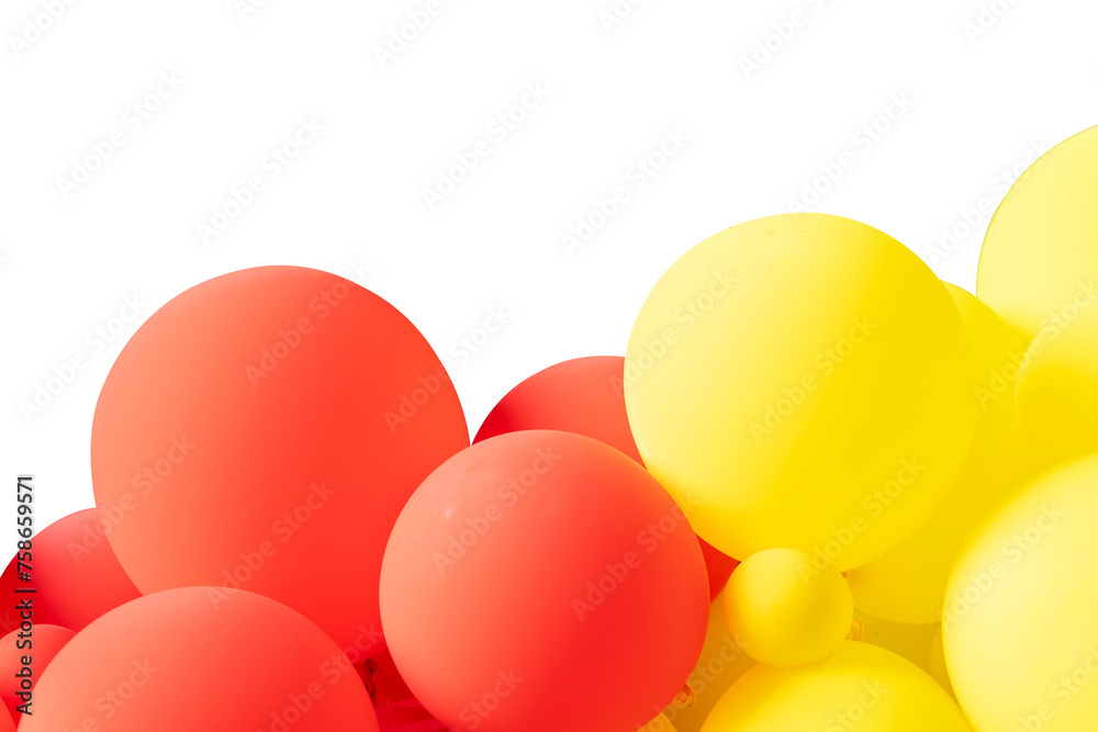 A bunch of red and yellow balloons floating on a white background. The ...