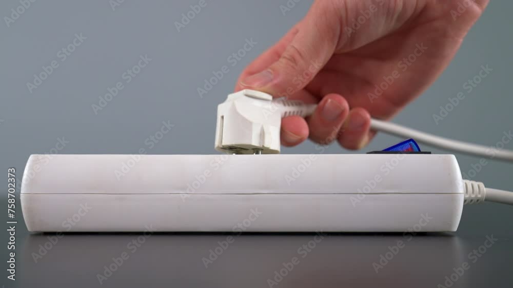 Electrical extension cord with electrical plug. Extension cord on a ...